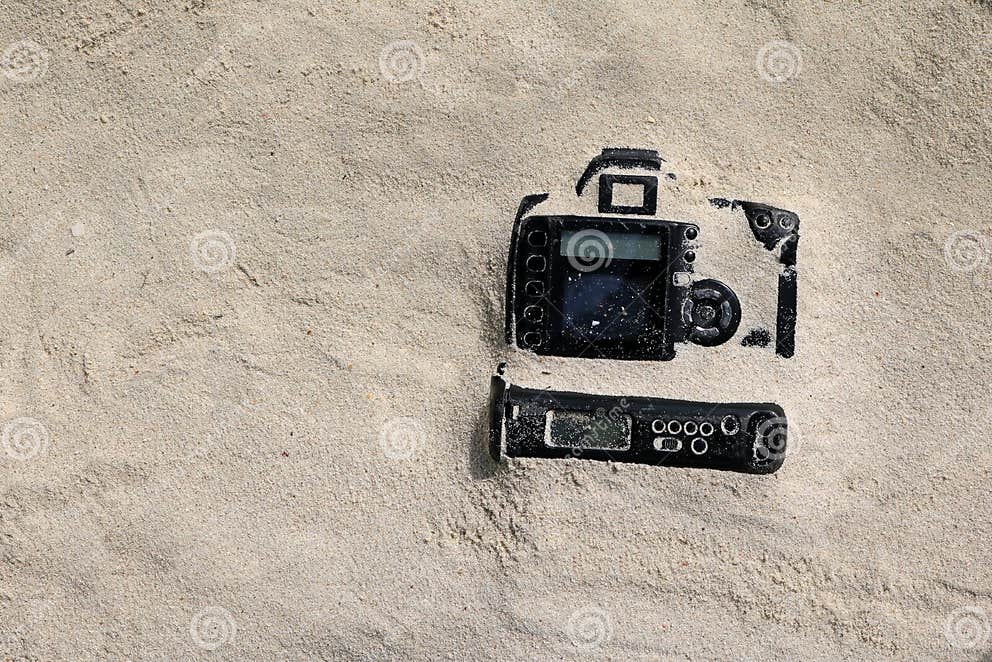 Cameras in the sand. stock photo. Image of mobile, lost - 79412878