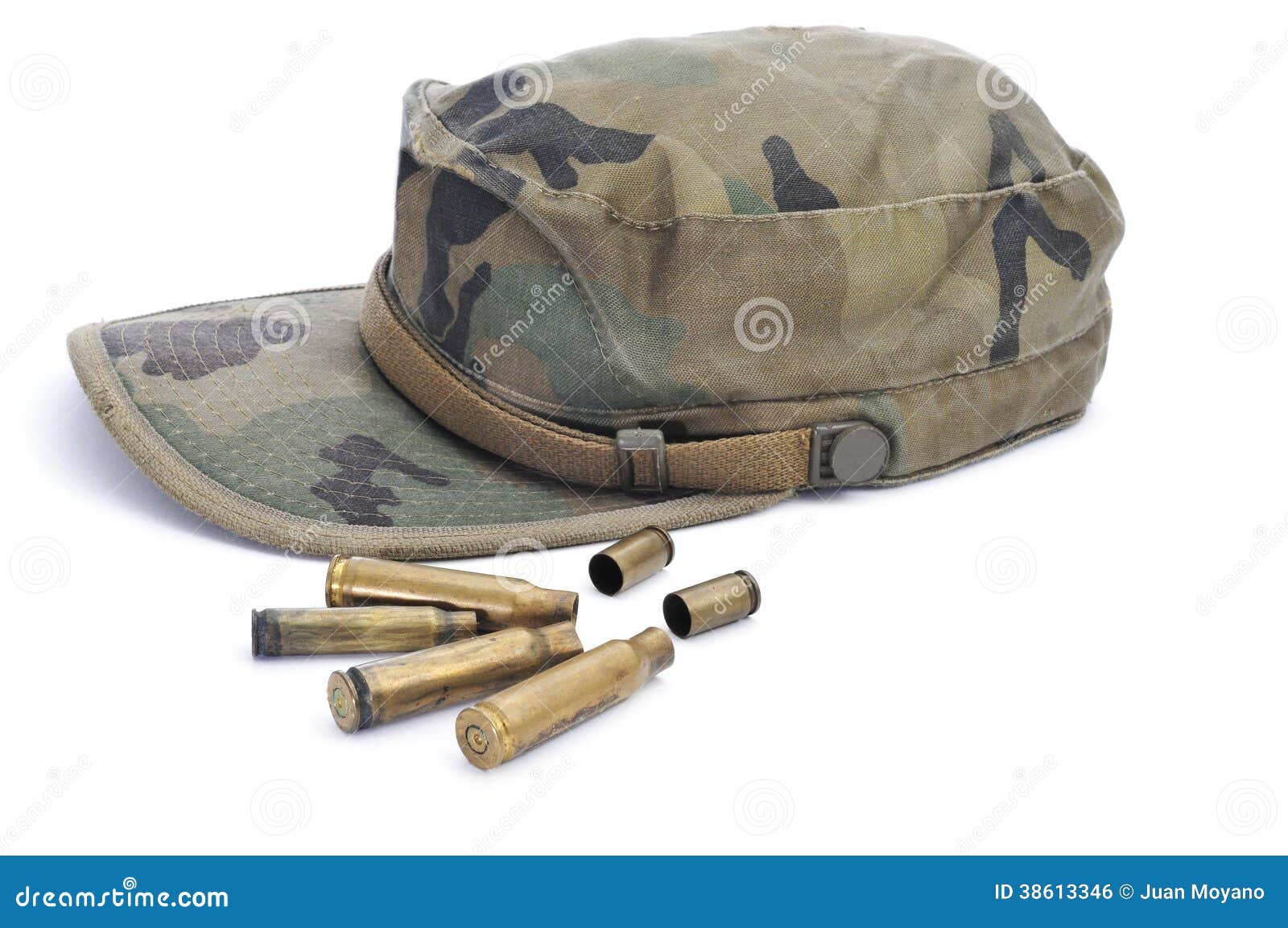 Camouflage Cap and Empty Bullets Stock Photo - Image of cartridges ...