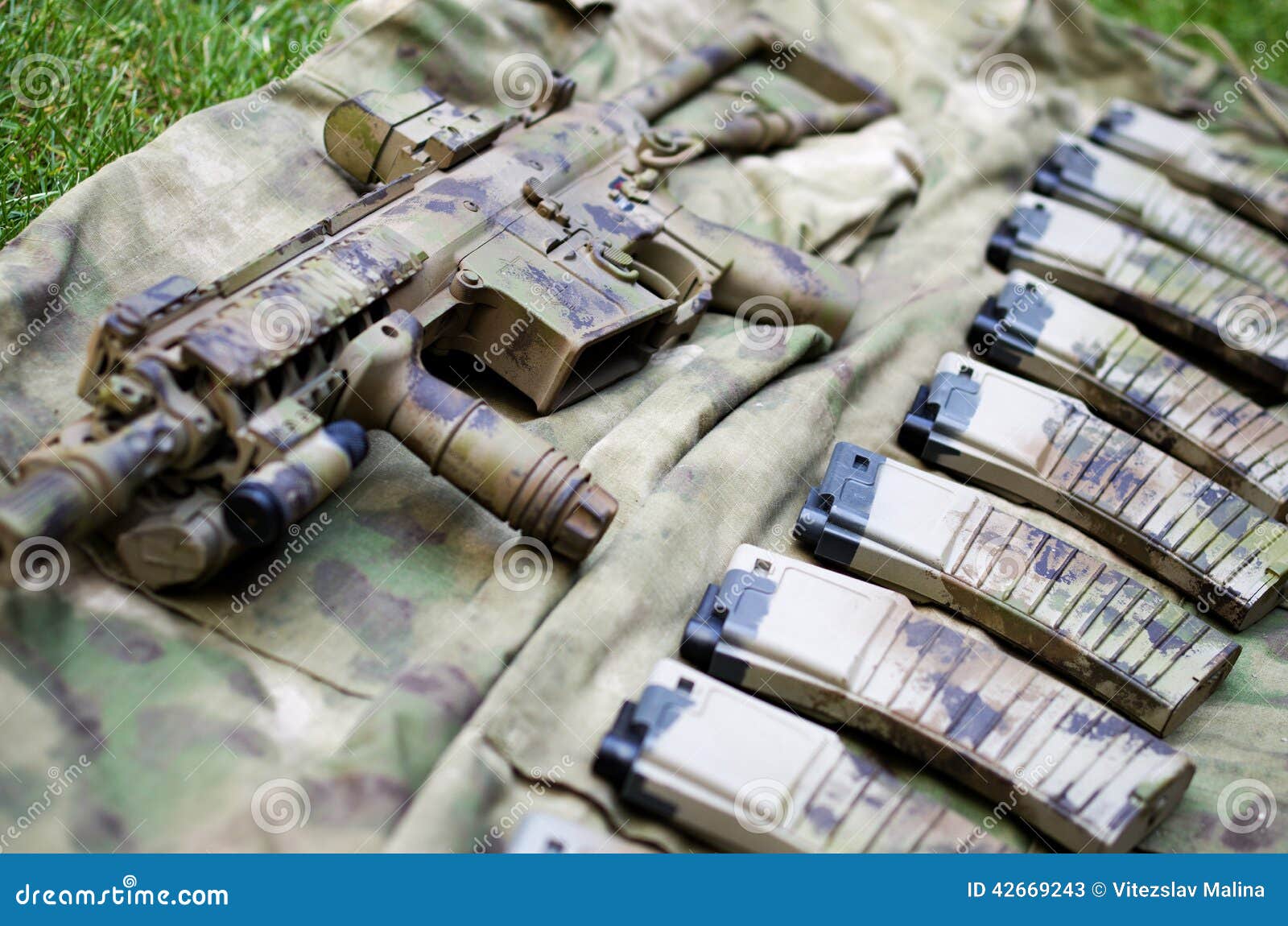 Camouflaged assault rifle stock image. Image of weapon - 42669243
