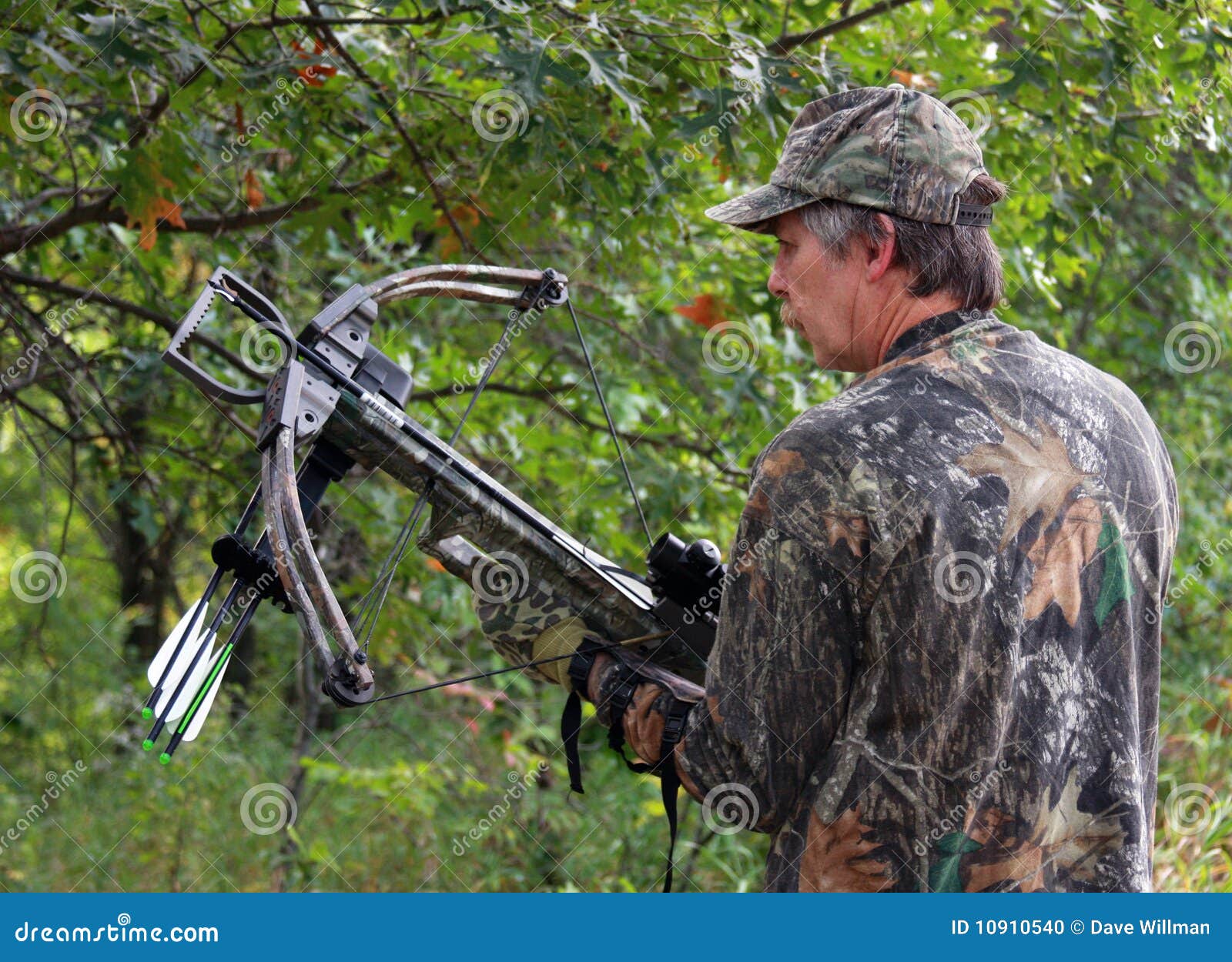 Camouflaged Crossbow Hunter Stock Photo - Image of woods, camouflage ...
