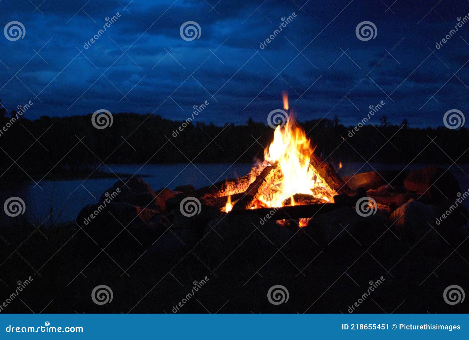 Camp Fire. Silhouette Of Tourist Around Campfire At Night. Bonfire ...