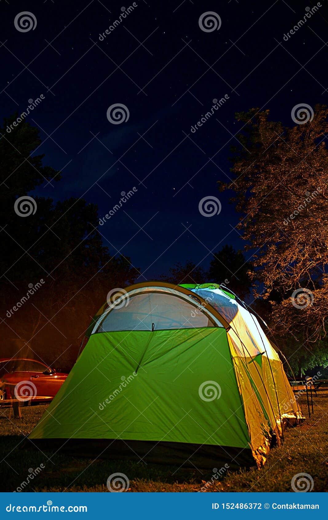 The Camp Fire at the Camping Base with Base Camp Setup. Stock Photo ...