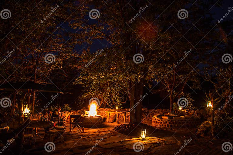 Camp Fire with Lanterns at Night Stock Photo - Image of dawn, night ...