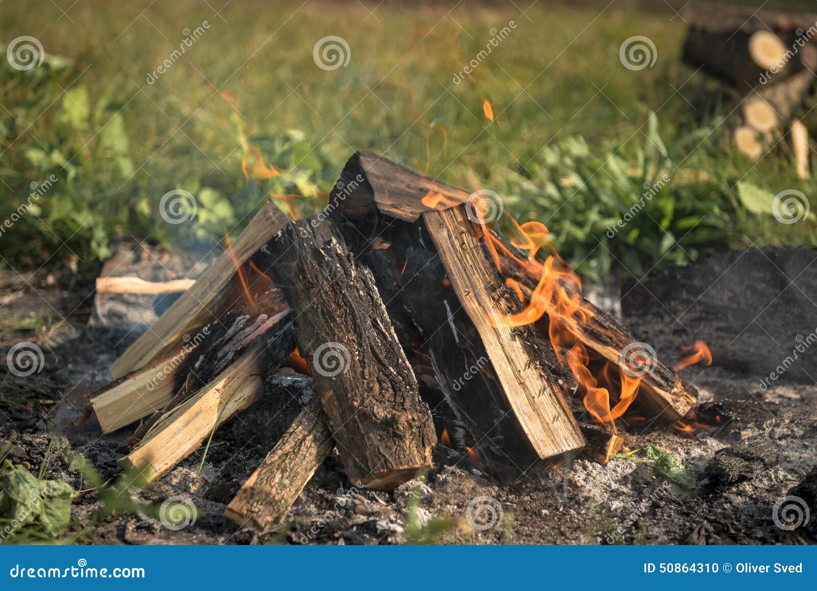 Camp fire outdoors burning stock photo. Image of campsite - 50864310