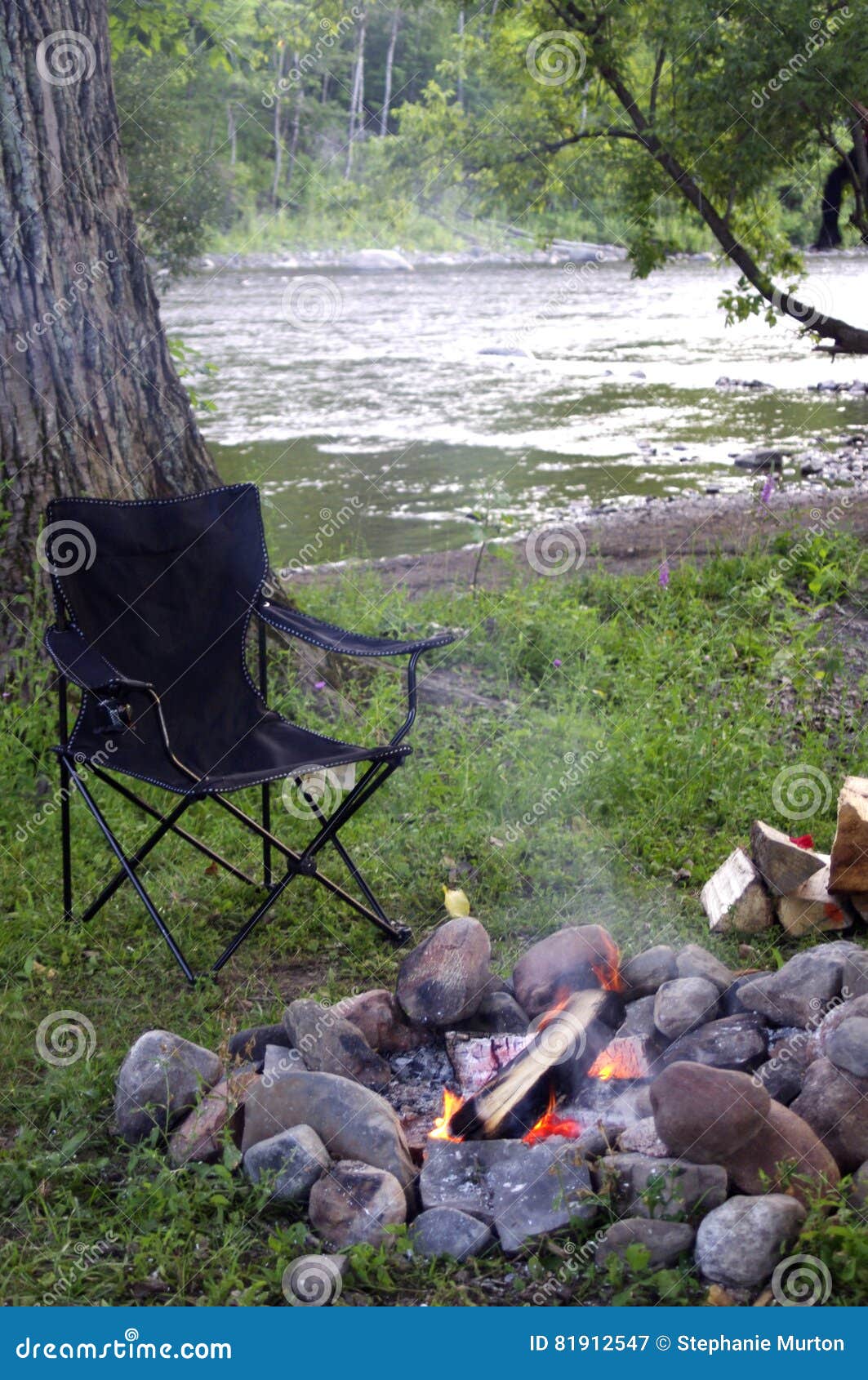 Camp fire Seat stock image. Image of outdoors, camping - 81912547