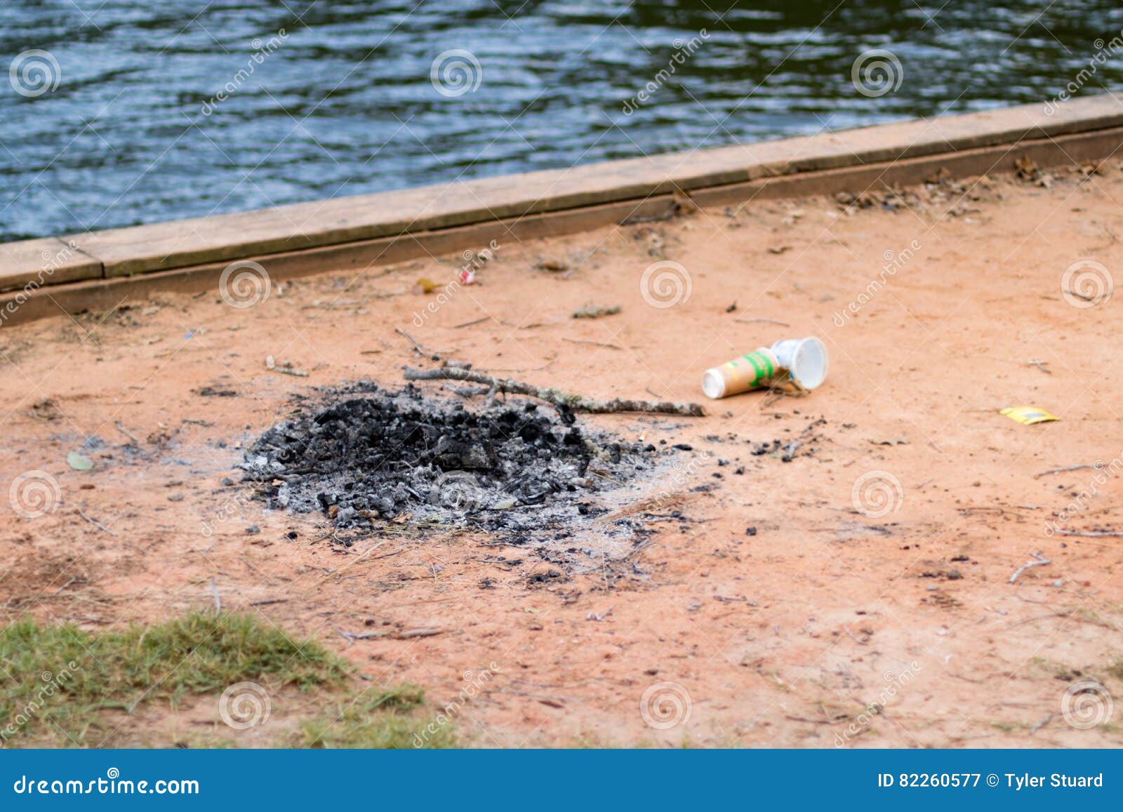 Campfire ashes and trash stock image. Image of ashes - 82260577