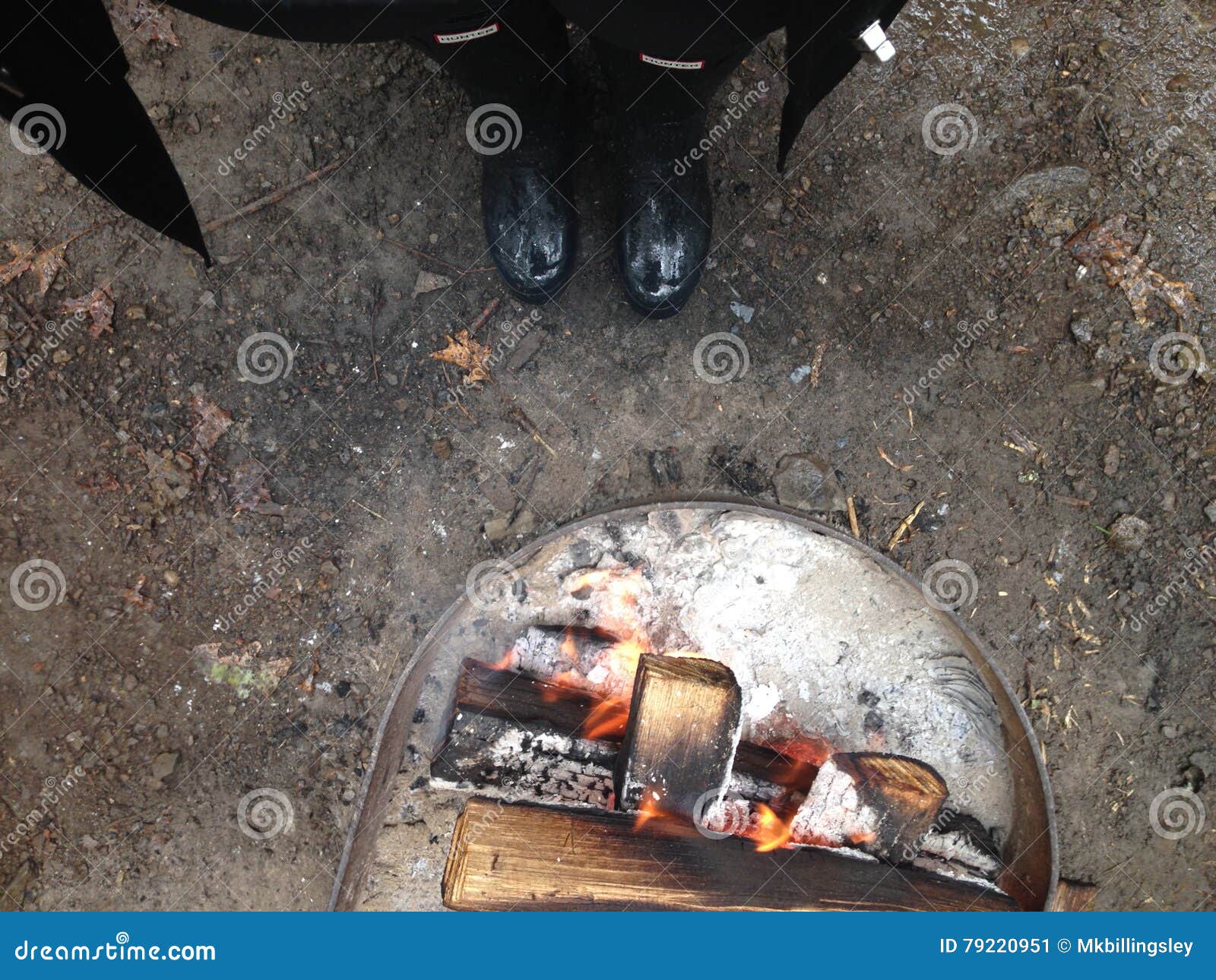 Campfire with boots stock image. Image of standing, burning - 79220951