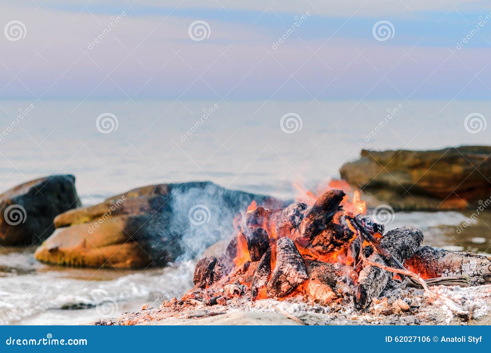 Campfire on the coast stock photo. Image of horizon, environment - 62027106