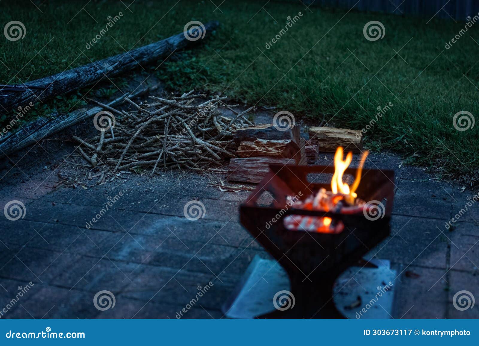 Campfire, Fire Pit Filled with Burnt Wood and Flames. Chopped Fire Wood ...