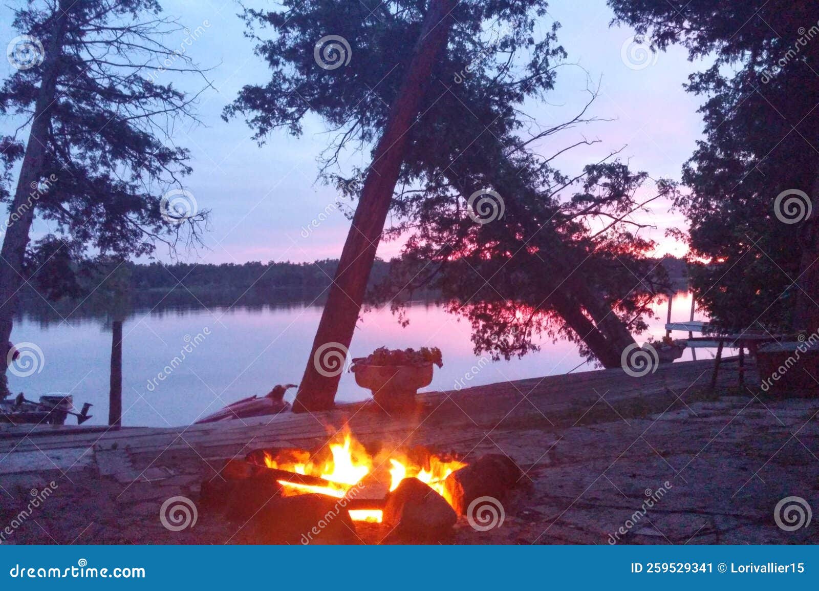 Campfire Lake Sunset stock image. Image of campfire - 259529341