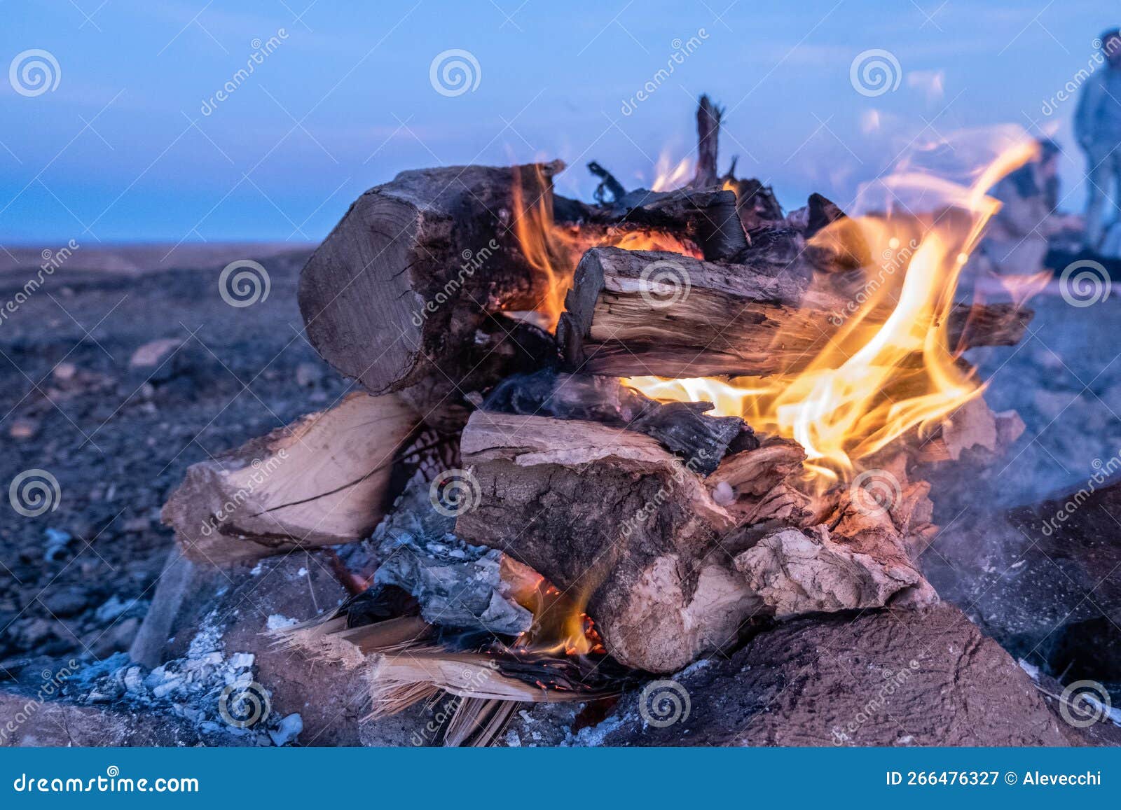 A Campfire Lit on the Top of a Mountain with the Desert As a Backdrop ...