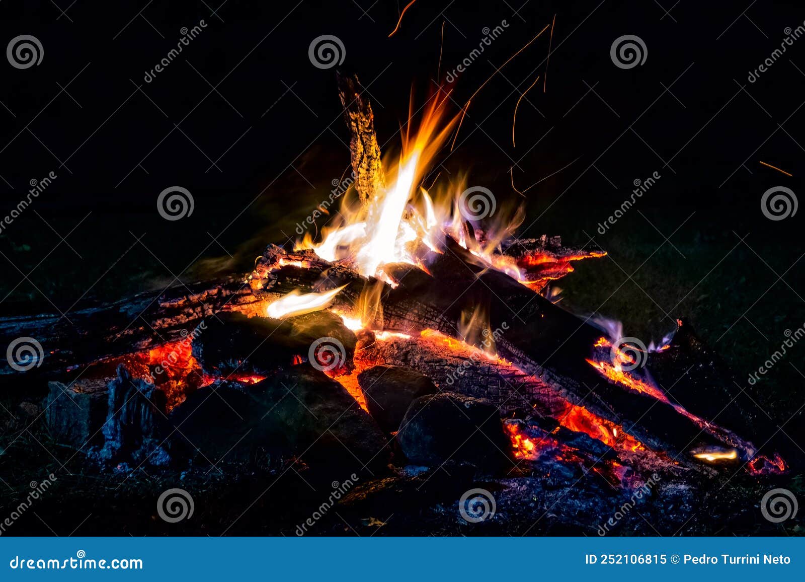Campfire at Night. Flames and Embers of a Bonfire at Night. Stock Image ...