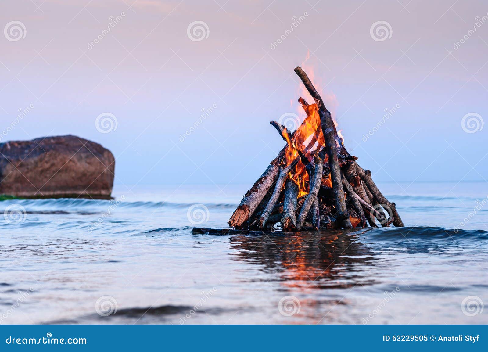 Campfire on the Sea Surface Stock Image - Image of aglow, flame: 63229505