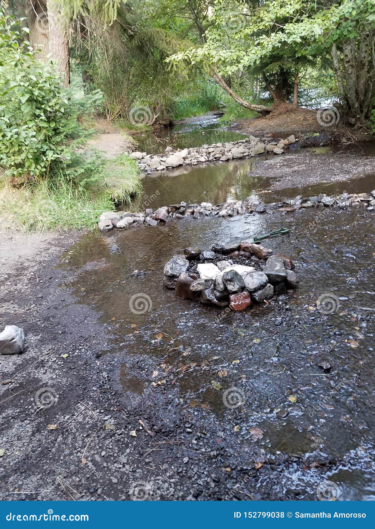 Campfire in a stream stock photo. Image of stones, handmade - 152799038