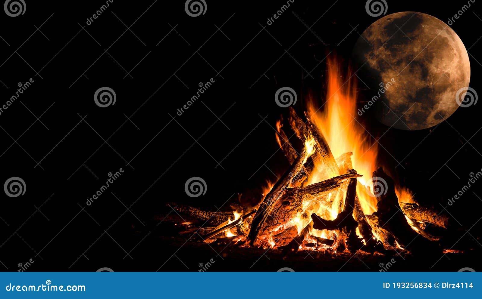 Campfire under a full moon stock photo. Image of full - 193256834