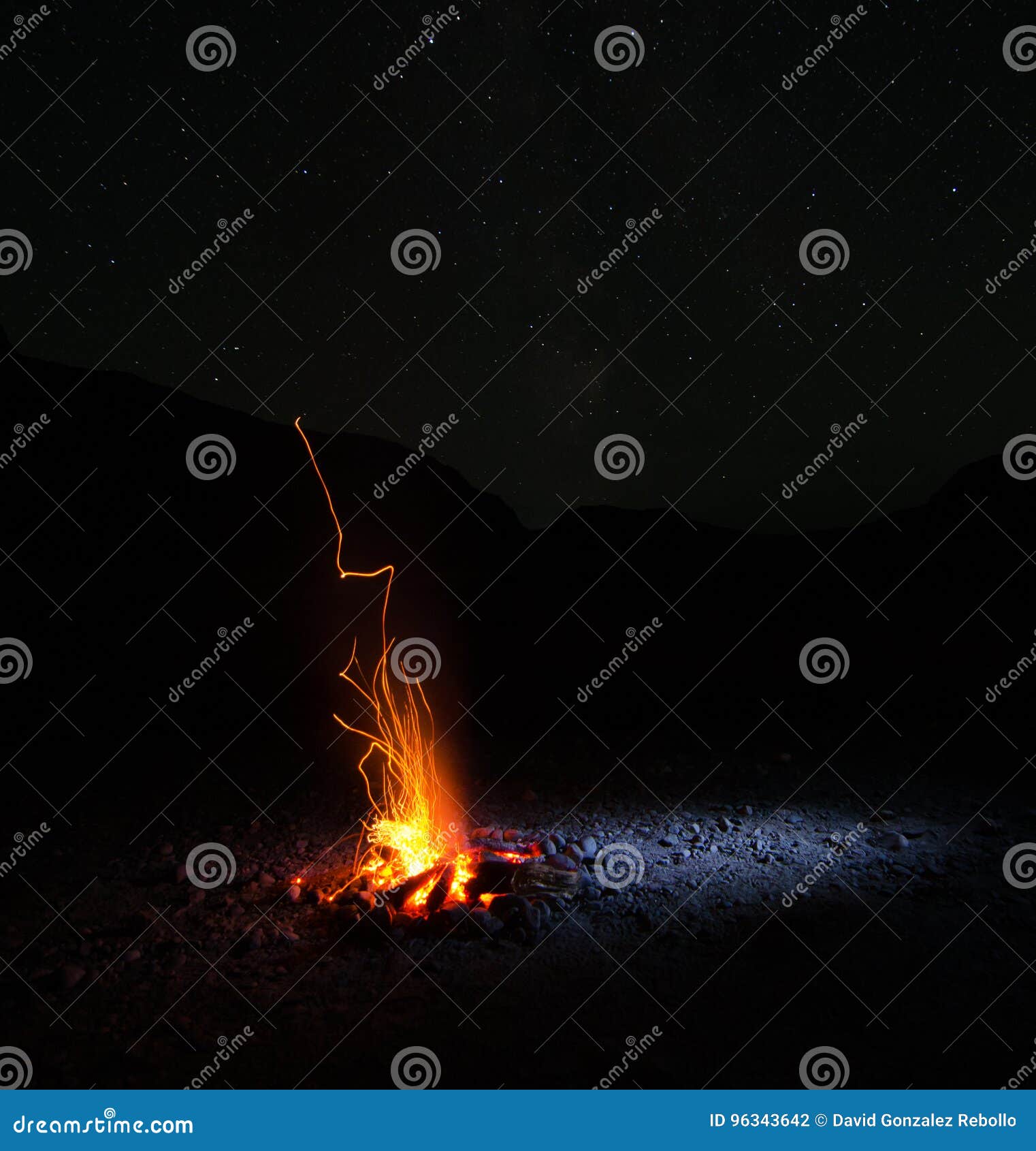 Campfire under the stars stock photo. Image of nature - 96343642