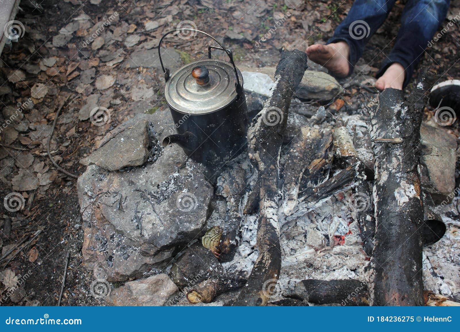 Campfire in the Wild Forest. Smoked Kettle Boiling on a Fire Â Stock ...