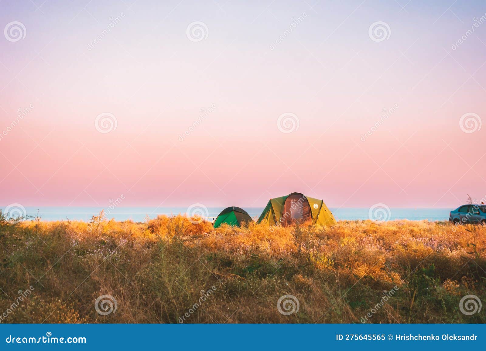 Camping in a Field by the Sea Stock Image - Image of peaceful, clouds ...