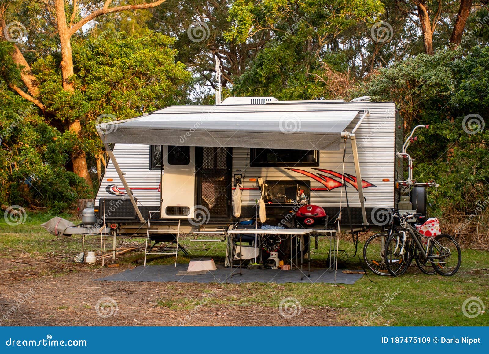 Camping Site and the Old Style Caravan Set Up with the Awning Editorial ...