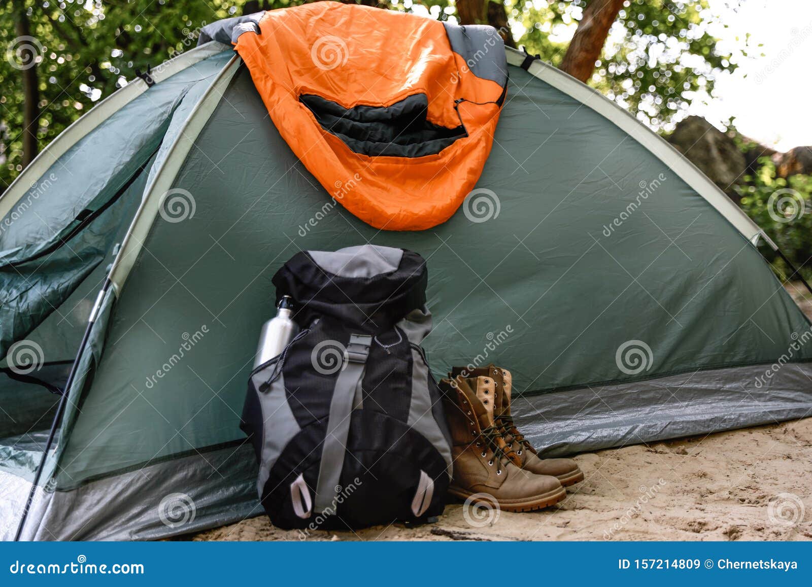 Camping Tent with Sleeping Bag, Boots and Backpack Stock Image - Image ...