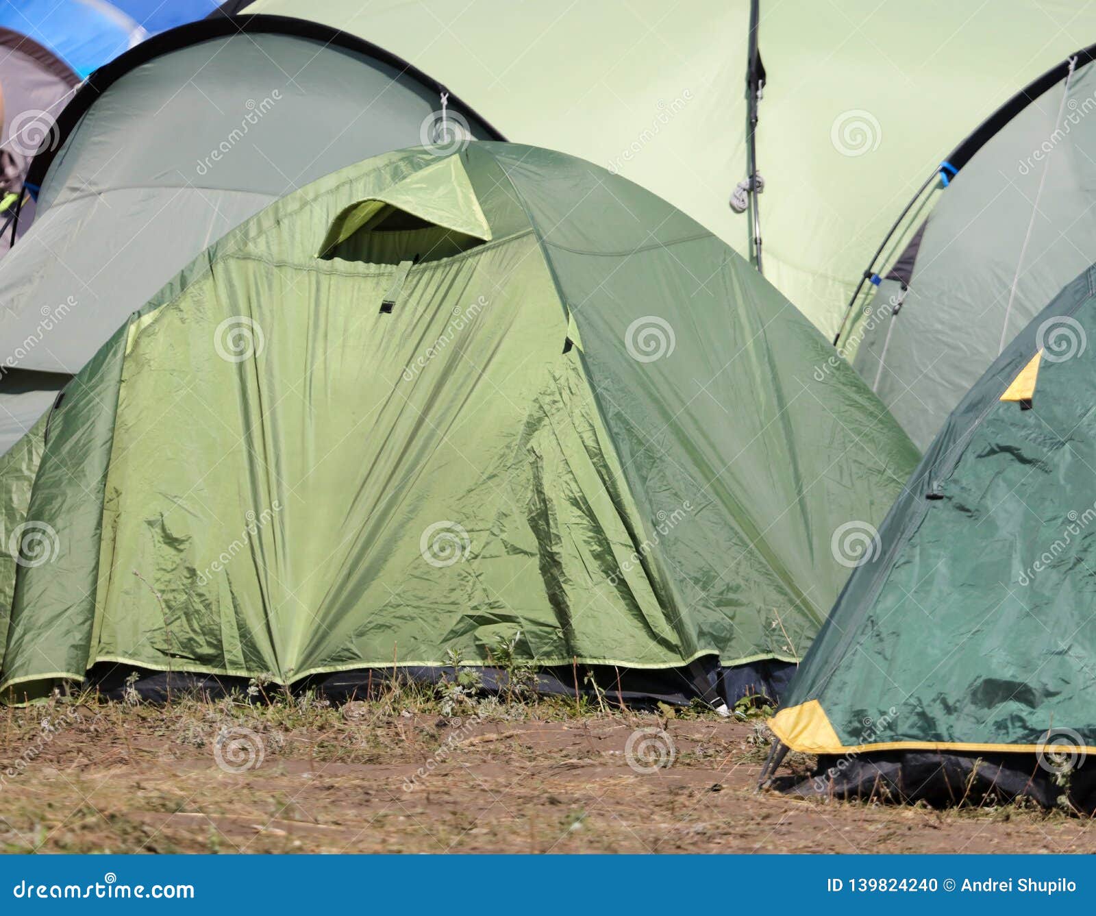 Camping of Tents in a Field in Nature Stock Photo - Image of area, tent ...