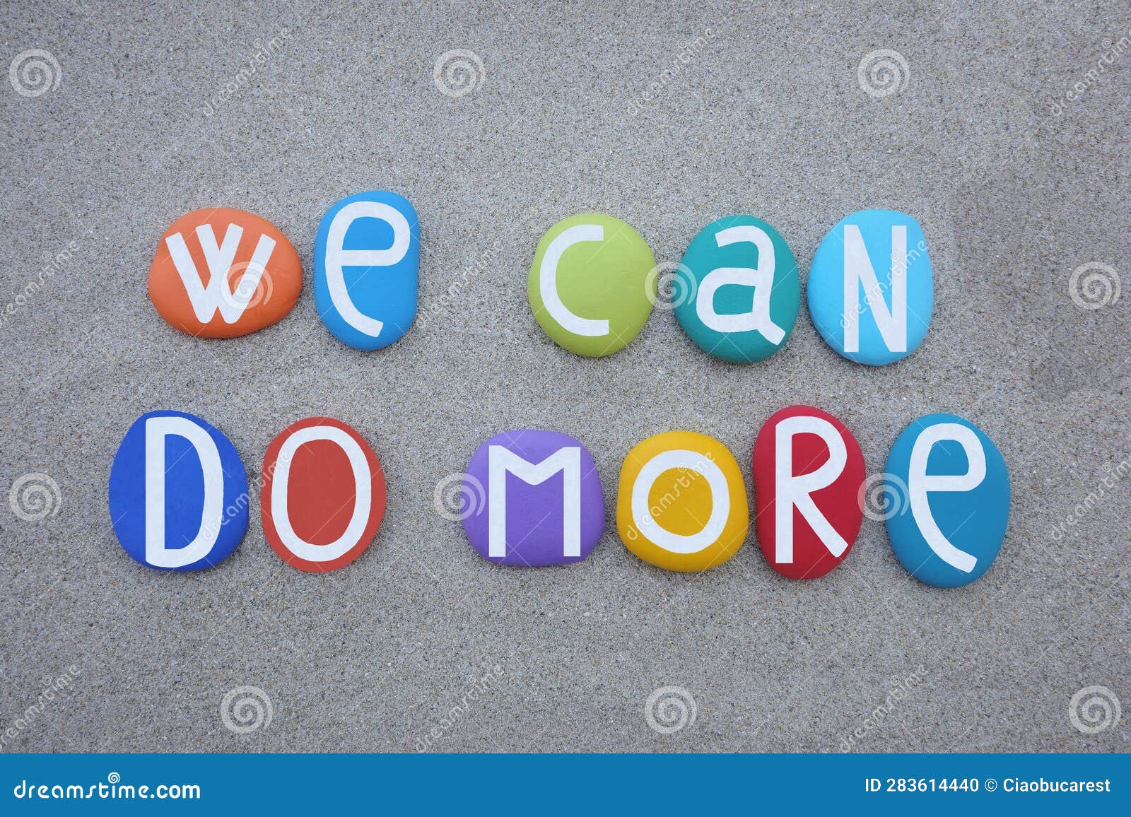 We Can Do More, Creative Slogan Composed with Multi Colored Stone ...