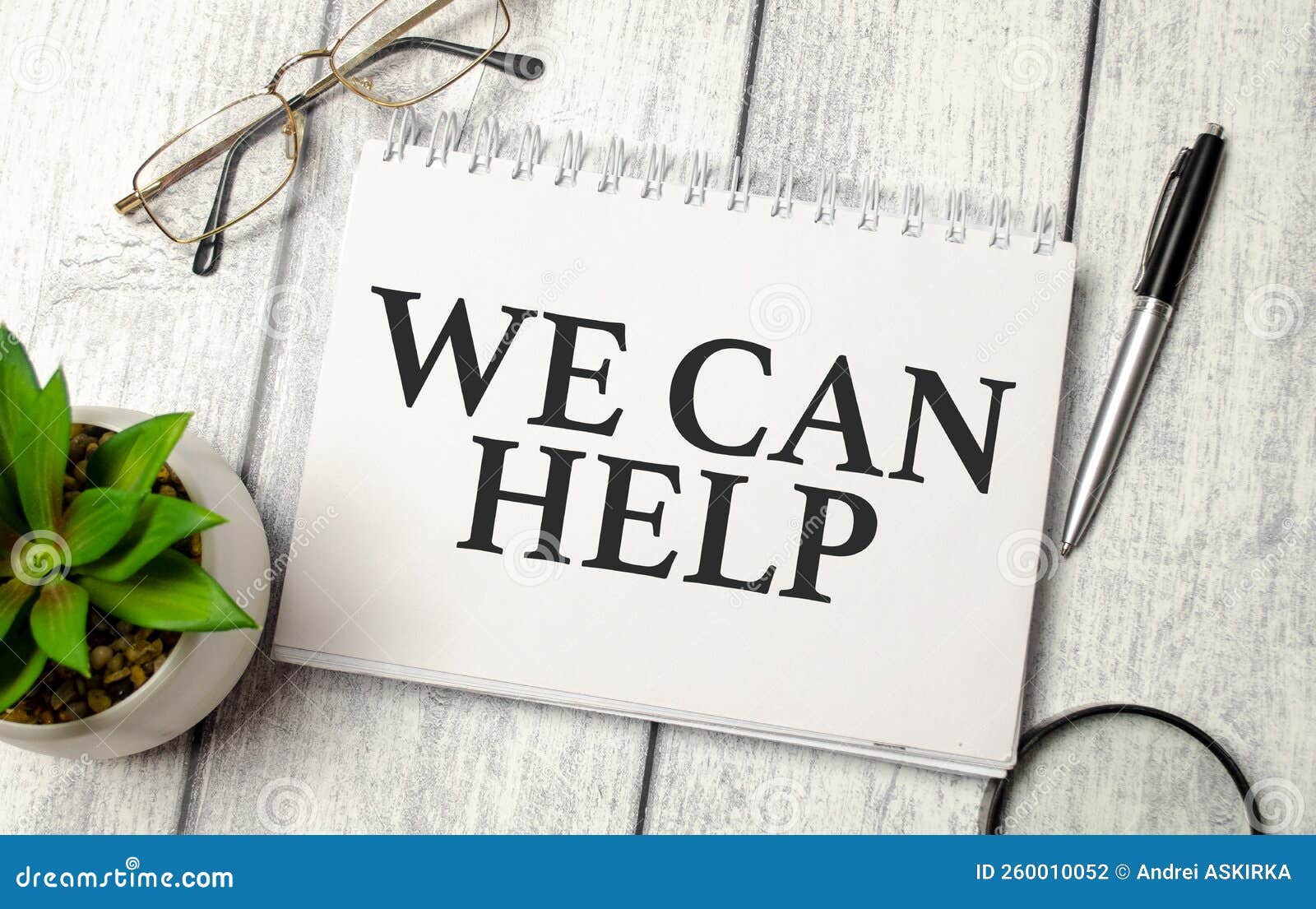 We Can Help on White Notebook and Office Supplies Stock Photo - Image ...