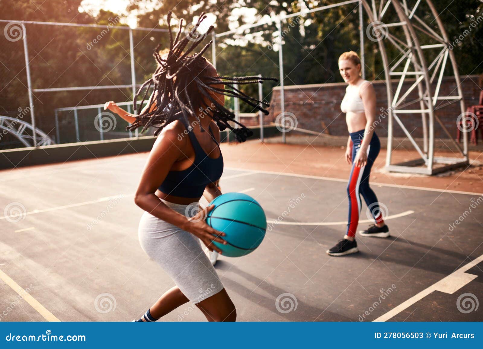 Can I Score From Here A Diverse Group Of Sportswomen Playing A