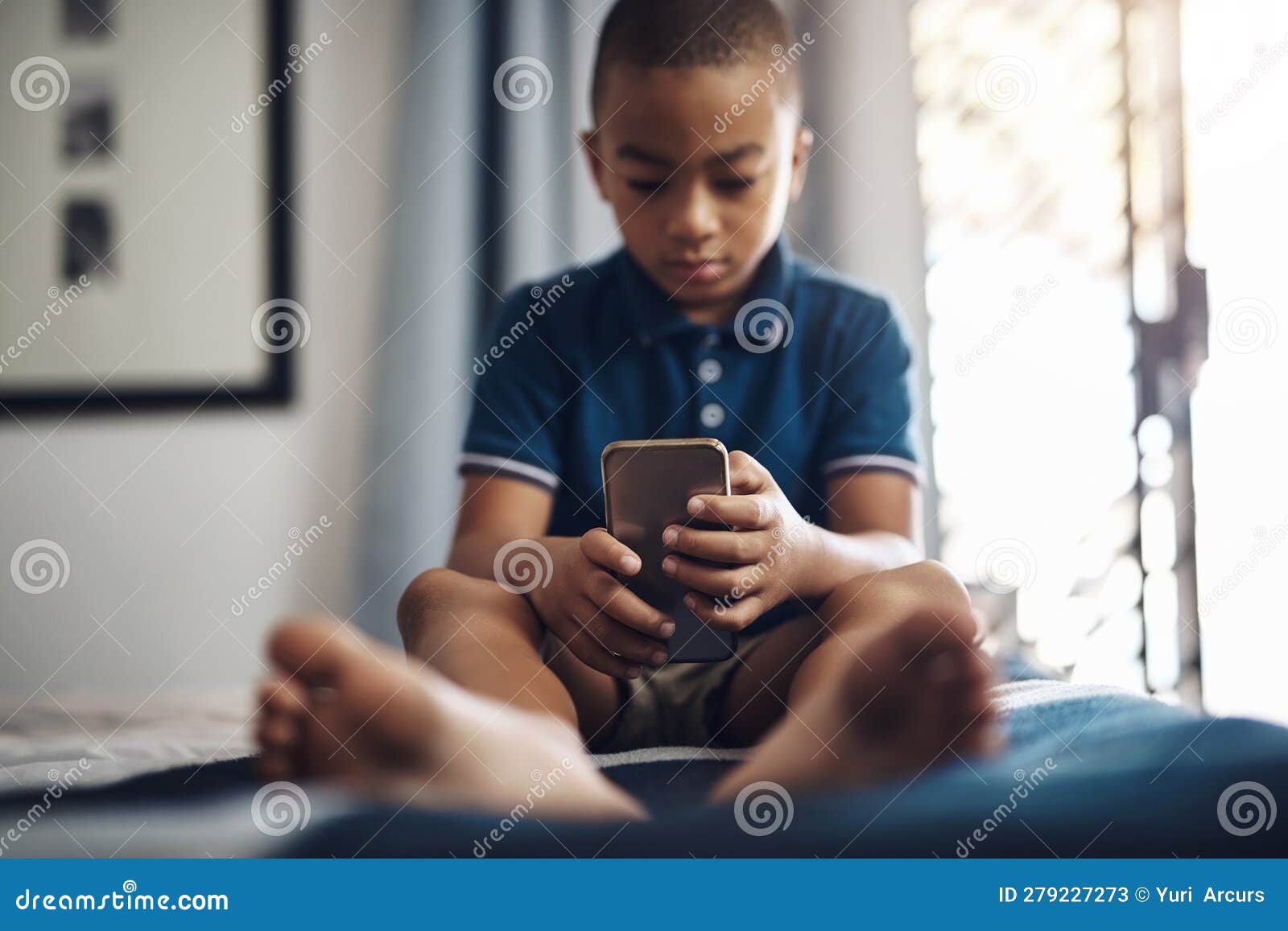 They Can Learn More about Just Anything Online. a Young Boy Using a ...