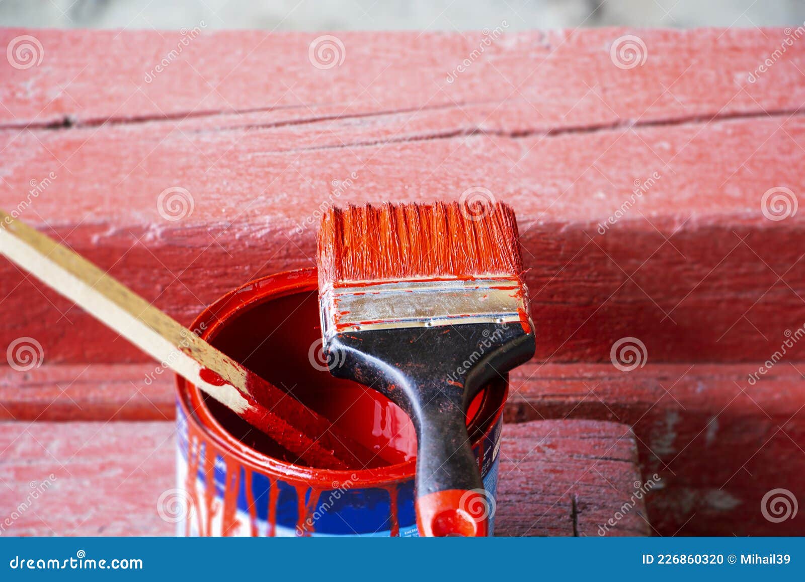 A Can of Red Paint and a Brush Stained with Paint. Painting Works ...