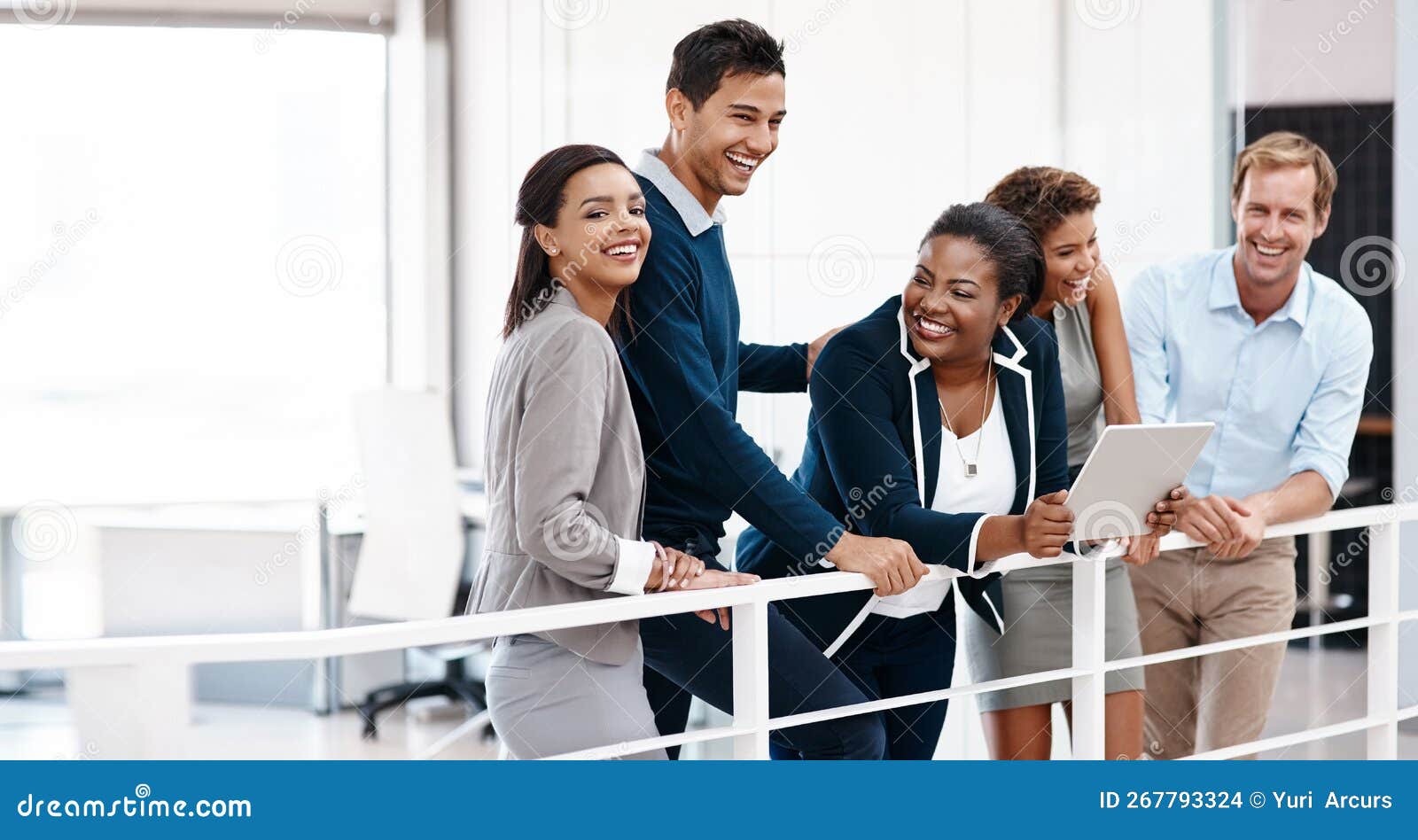 We Can Still Enjoy a Laugh at Work. a Happy Group of Colleagues Sharing ...