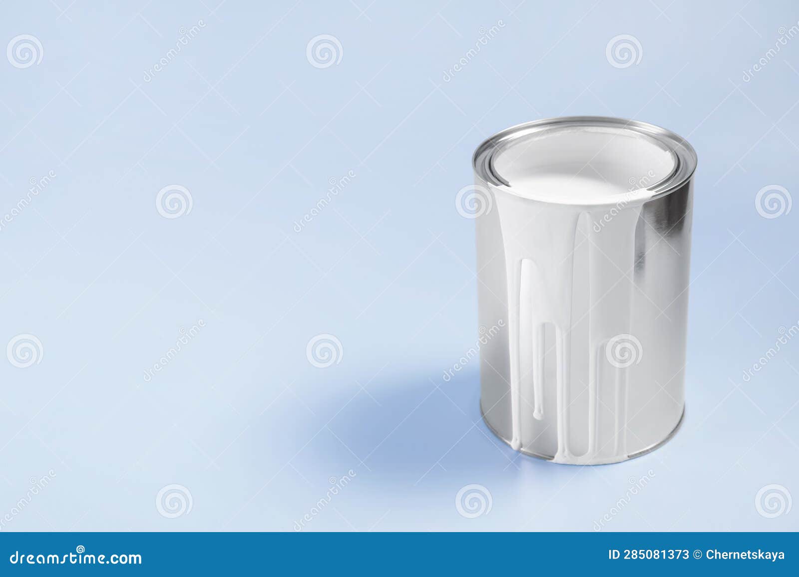 Can of White Paint on Light Blue Background, Space for Text Stock Image ...
