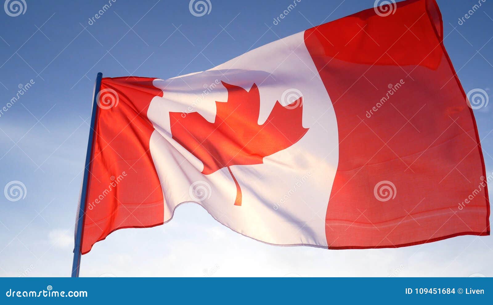 Canada Flag on Clear Blue Sky Stock Photo - Image of flag, maple: 109451684