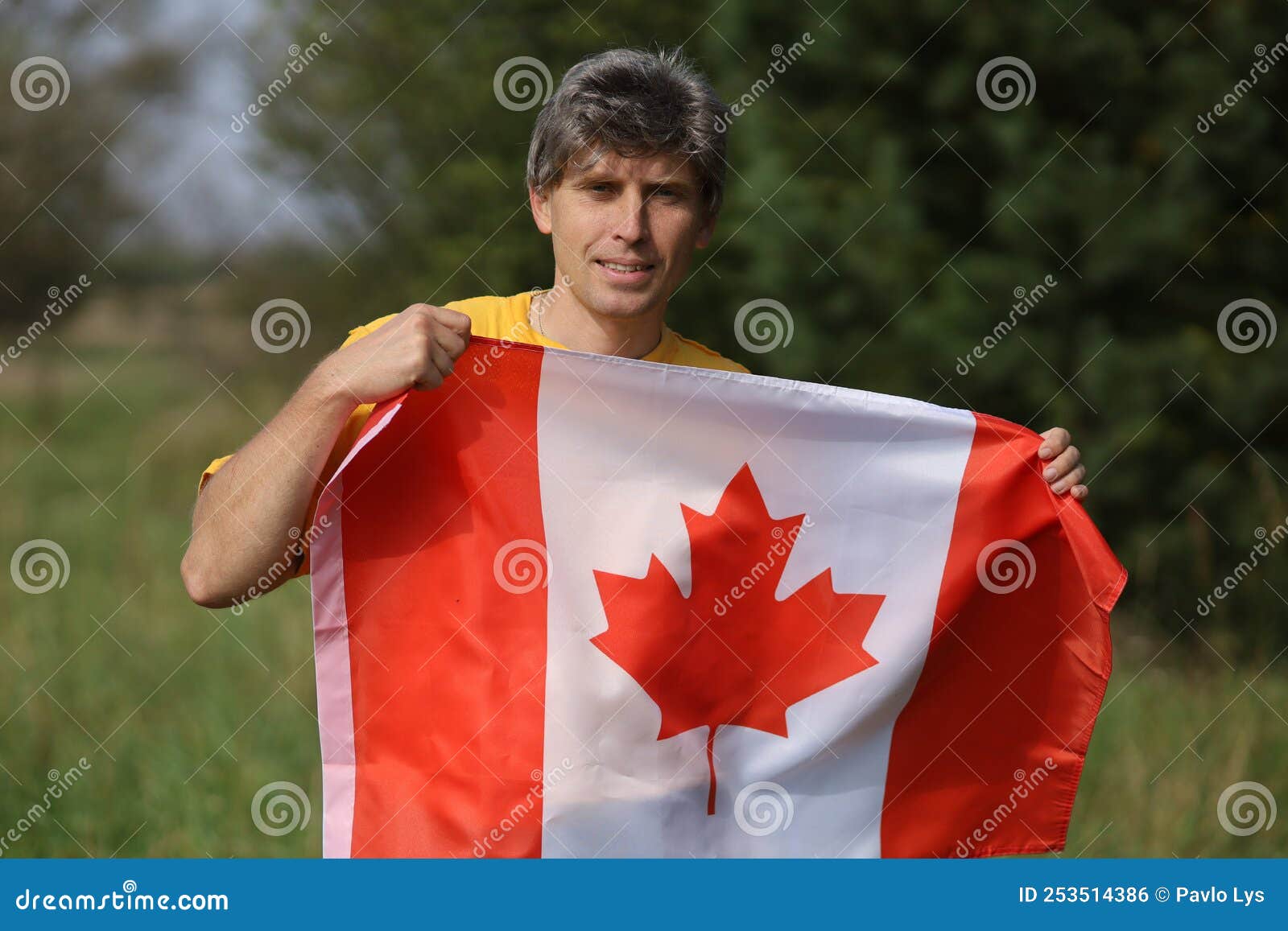 Canada Flag in the Hands of a Man Stock Photo - Image of flag, canadian ...