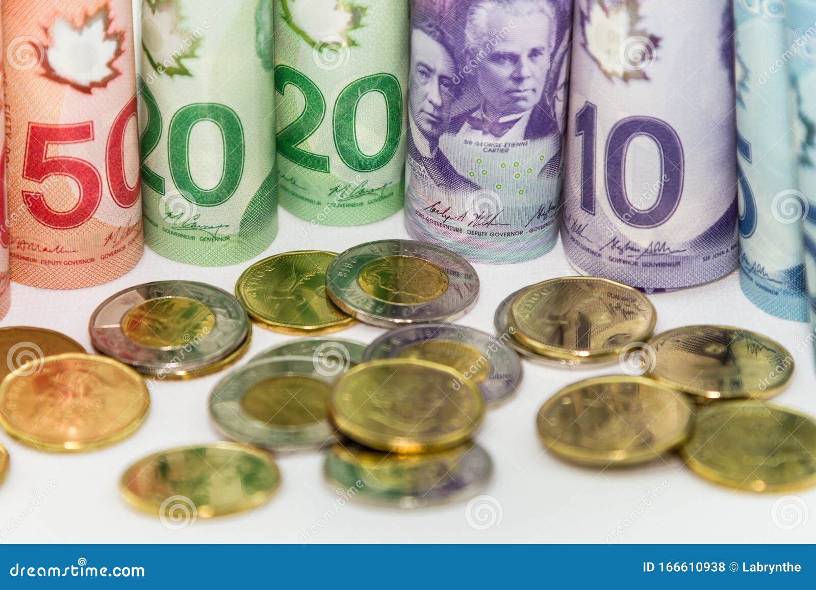 Canadian Dollar Bills and Coins on a Table, Canadian Currency Editorial ...