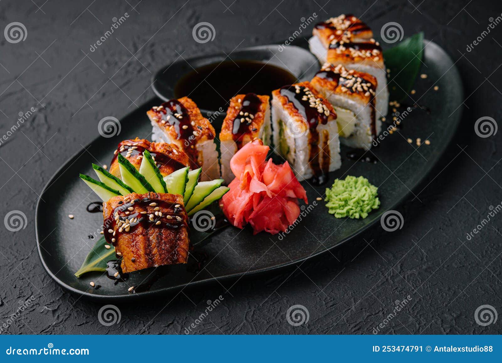 Canadian Roll with Eel on Black Plate from Stone Stock Image - Image of ...