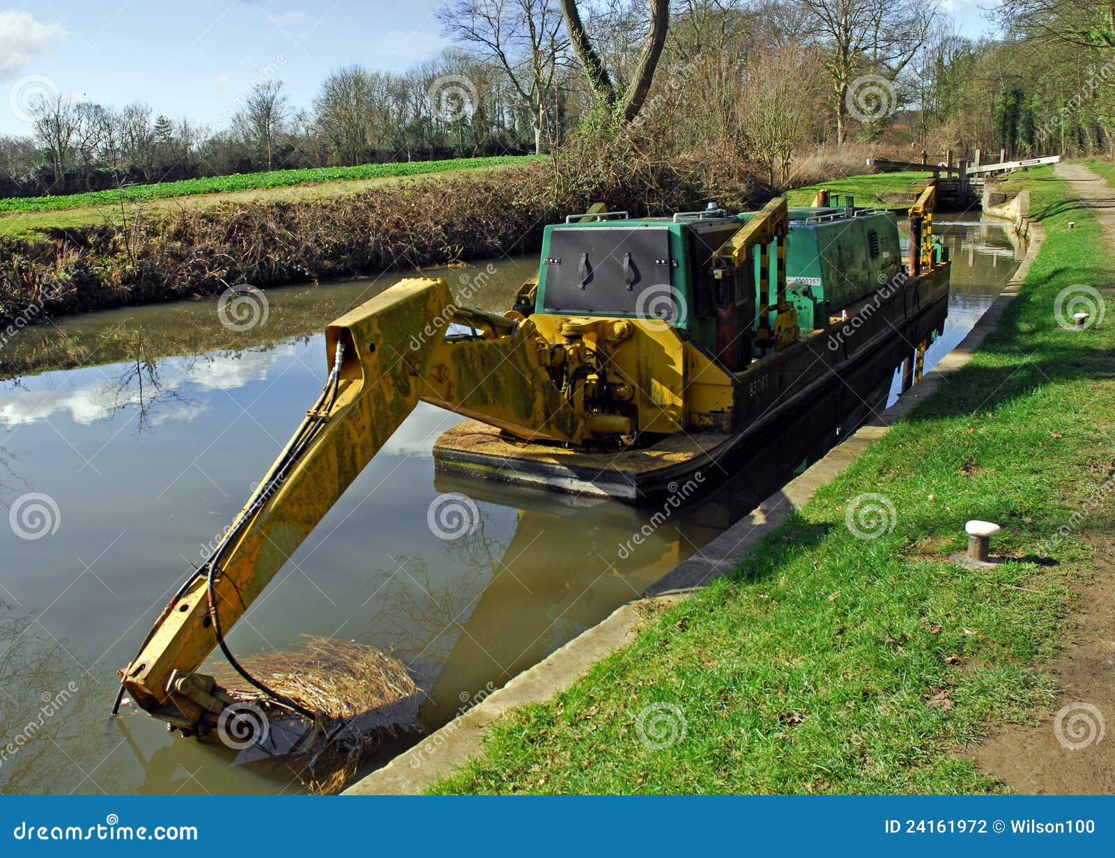Canal Boat with Pneumatic Digging Arm Stock Photo - Image of water ...