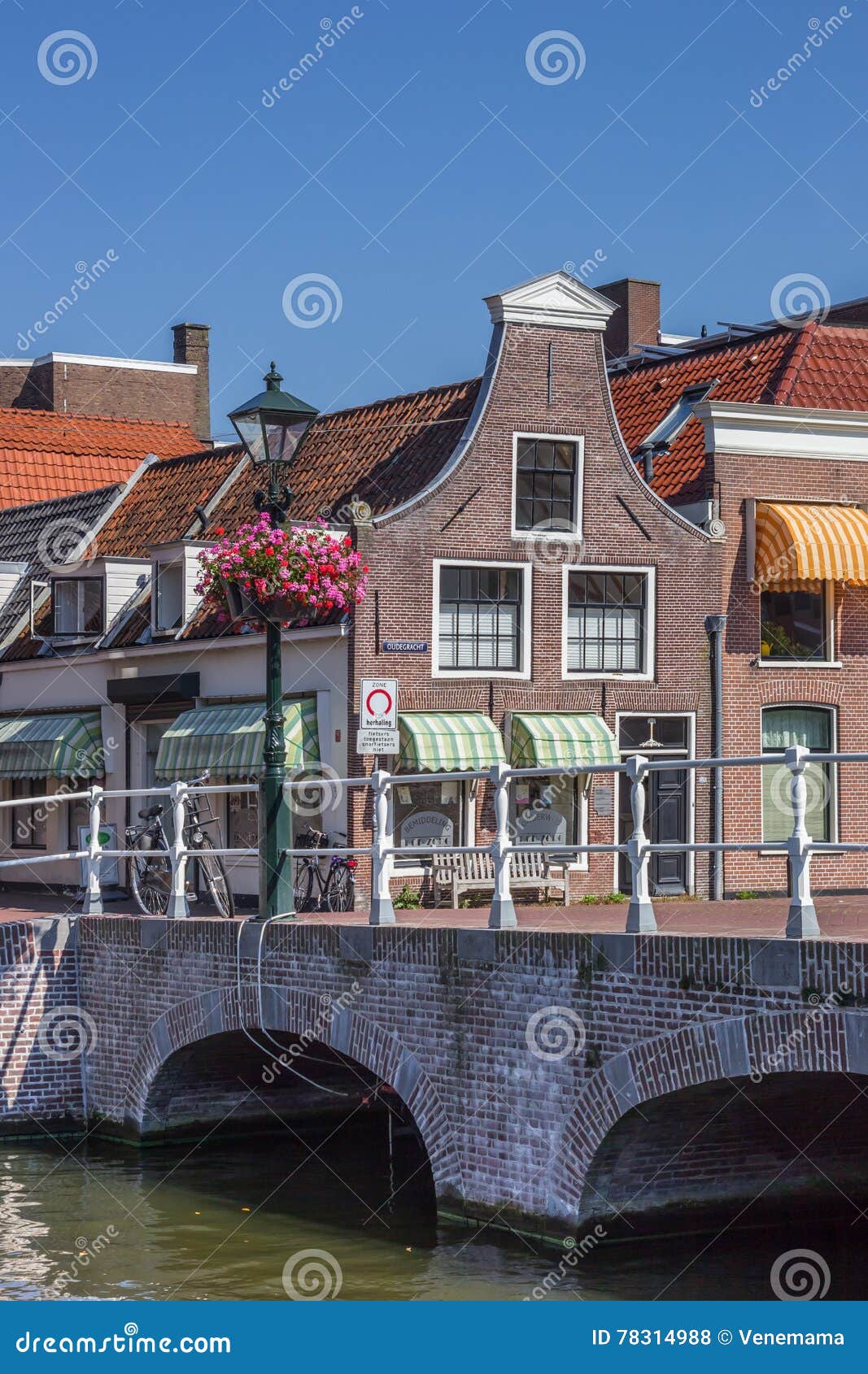 Canal, Bridge and Clock Gable in the Center of Alkmaar Editorial Stock ...