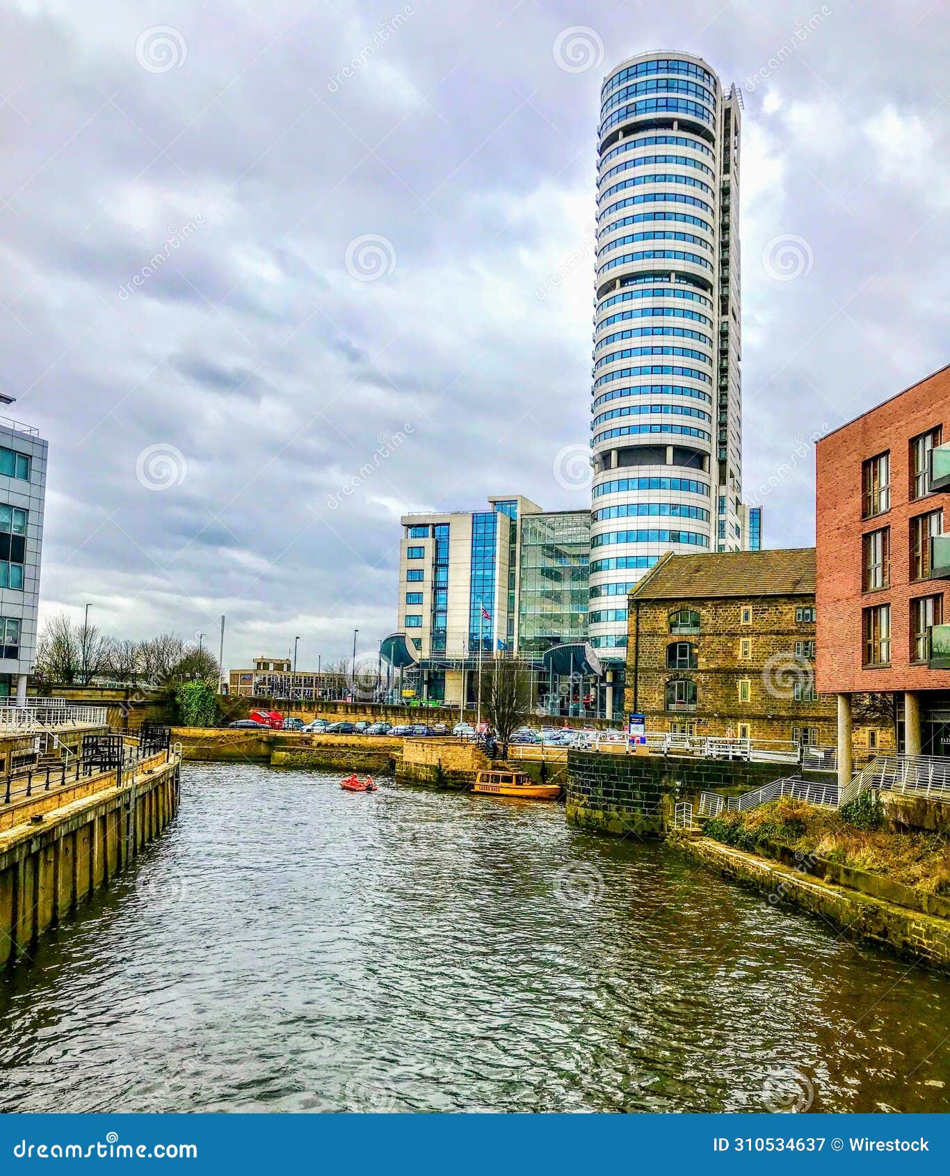 Canal Flows through a Cityscape with Tall Buildings Editorial ...