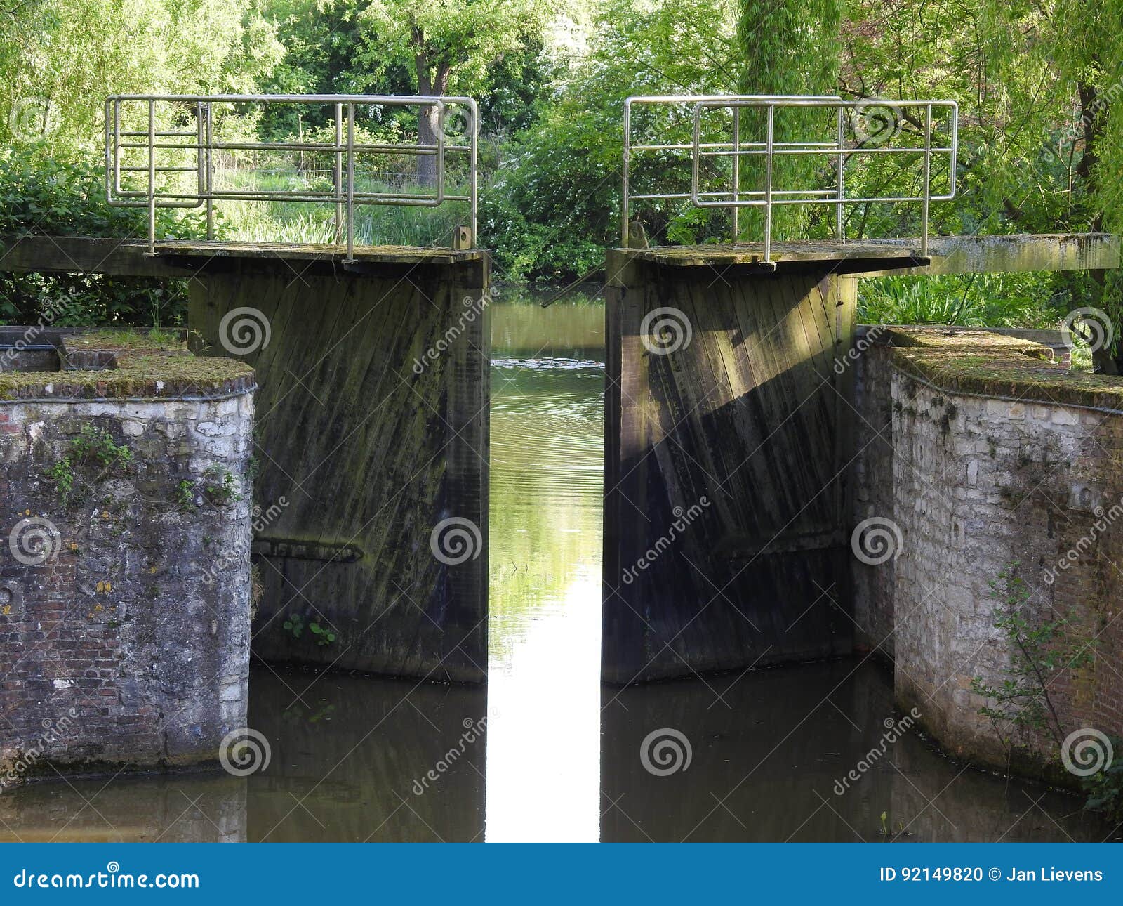 Canal and old water lock stock photo. Image of green - 92149820