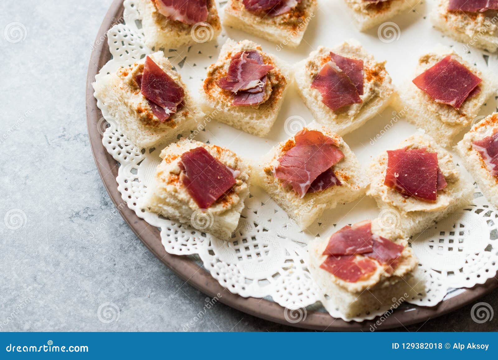 Canape with Pastrami / Pastirma Ham and Hummus on Small Square Bread ...