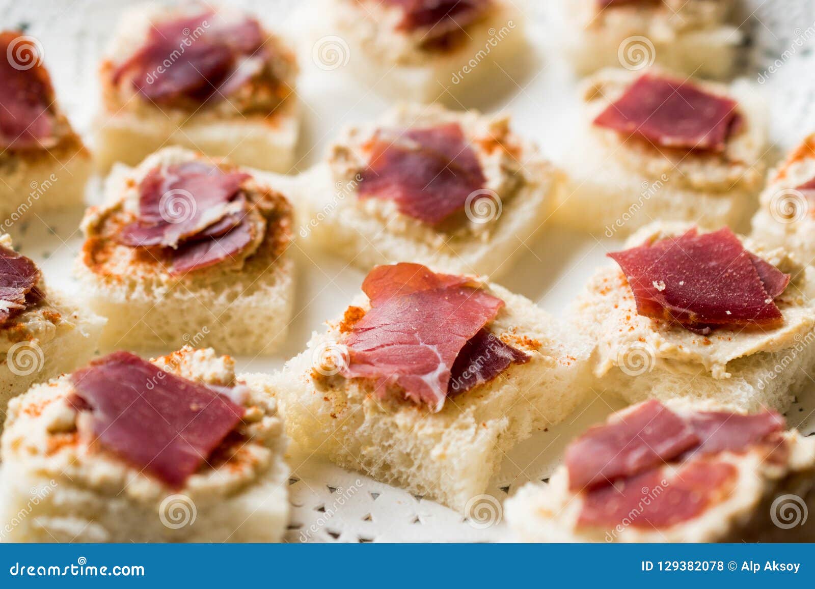 Canape with Pastrami / Pastirma Ham and Hummus on Small Square Bread ...