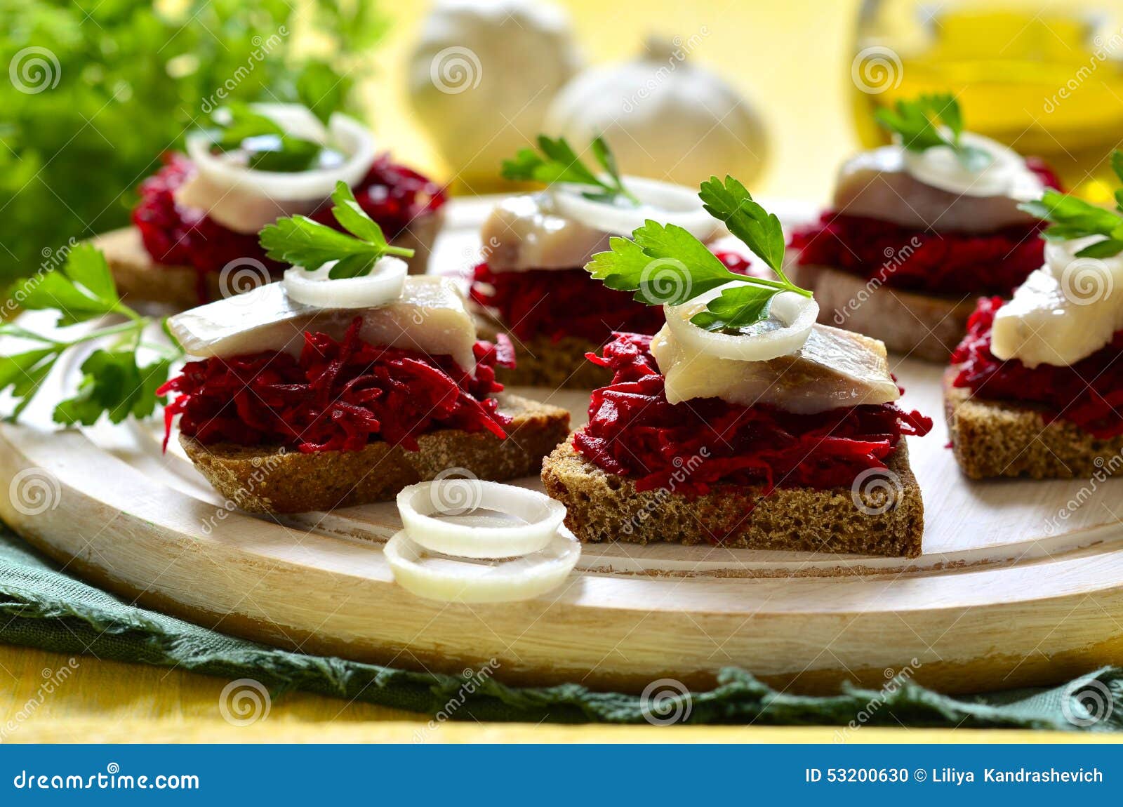 Canape from Rye Bread with Herring Slice and Beetroot. Stock Photo ...