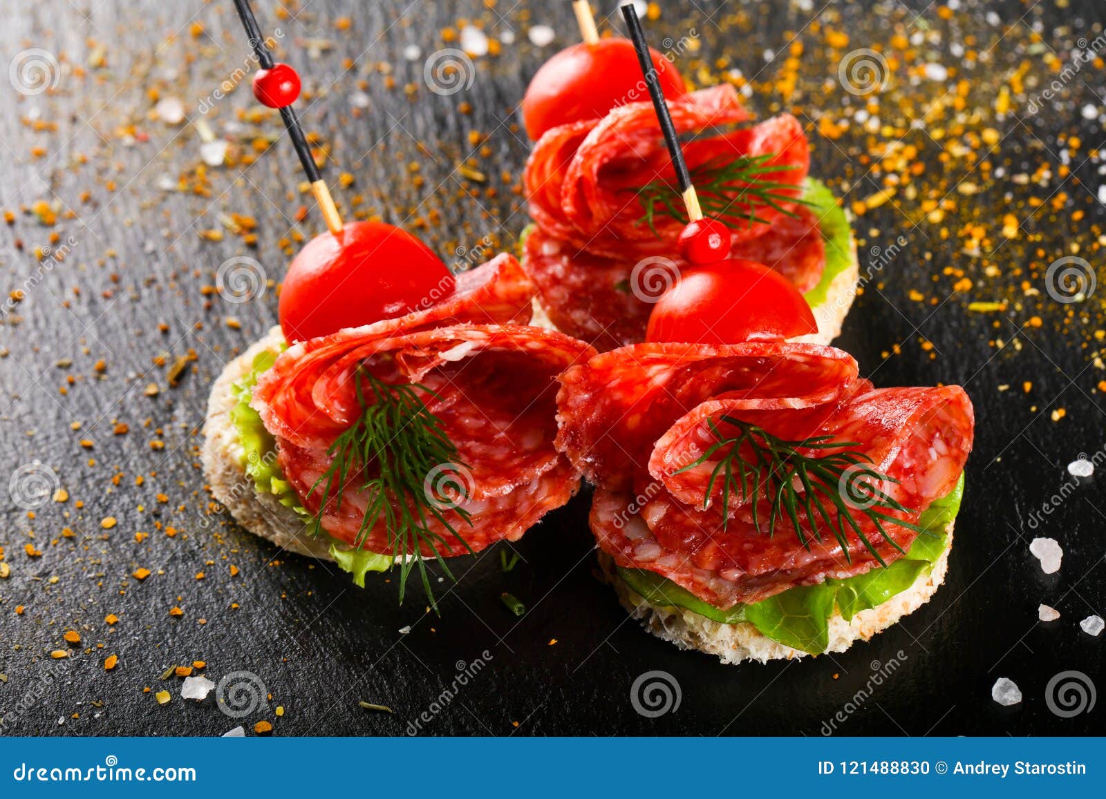 Canape with salami stock photo. Image of plate, olive - 121488830