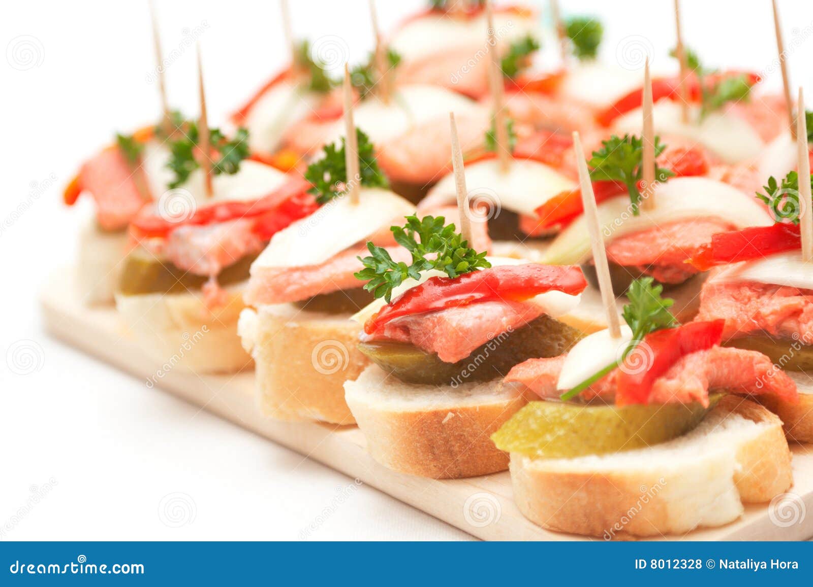Canapes Of Fish, Vegetables, Meat On A Plate On A White Background ...