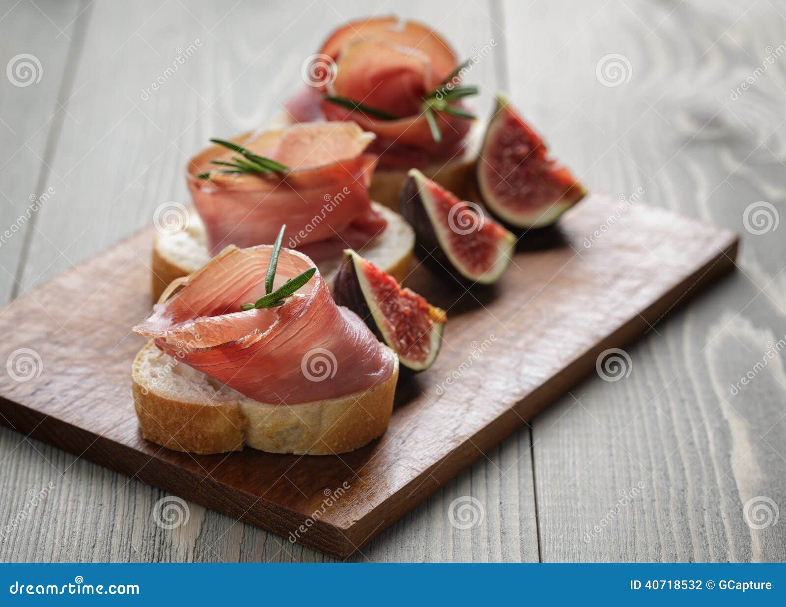 Canapes with spanish jamon stock photo. Image of sliced - 40718532
