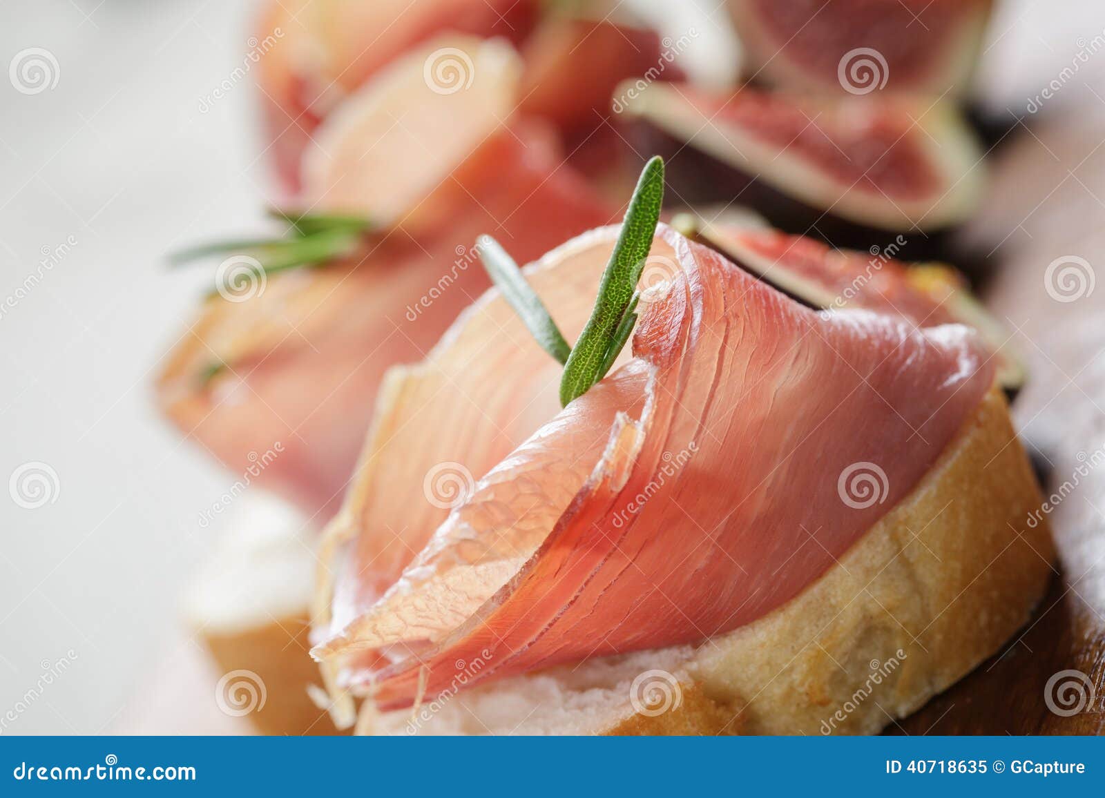 Canapes with spanish jamon stock image. Image of rosemary - 40718635
