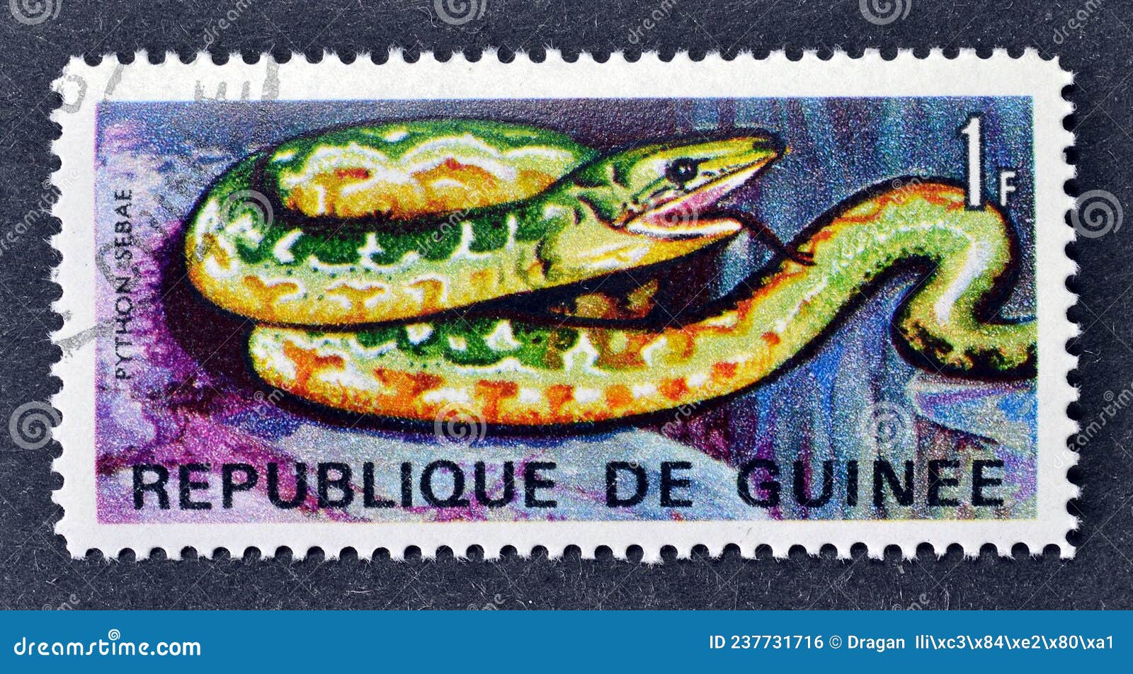 Cancelled Postage Stamp Printed by Guinea, that Shows African Rock ...
