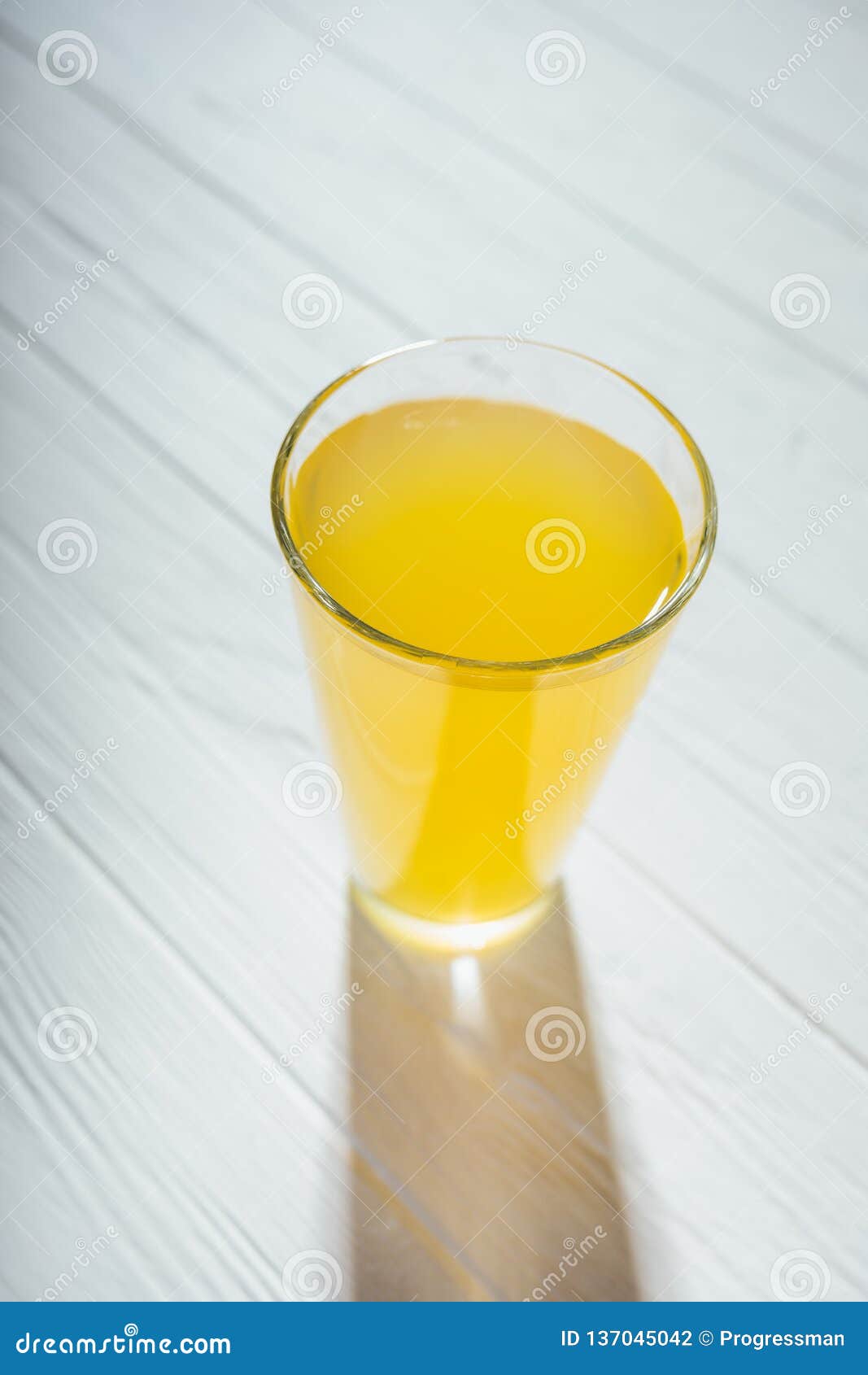 Candid Image of One Glass of Yellow Juice Stock Photo - Image of tasty ...