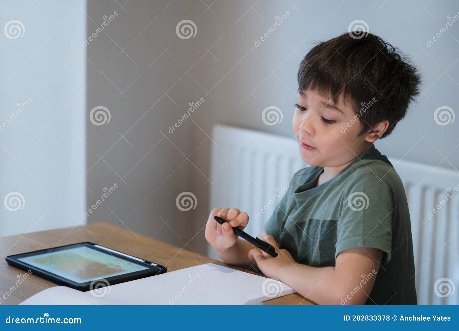 Candid Shot Kid Using Tablet for His Homework,Child Boy Making Surprise ...